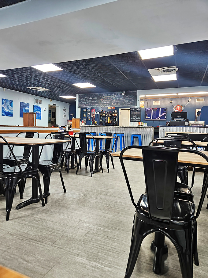 Modern industrial meets hometown comfort in this thoughtfully designed space. The chalkboard menu whispers, "Trust us, we know what we're doing."