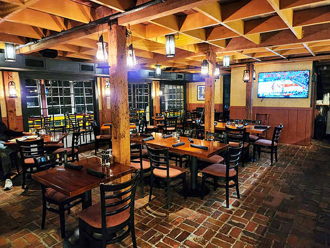 The brick floor and wooden tables aren't trying to impress anyone, which is exactly why they do. Classic steakhouse design that lets the food be the star.