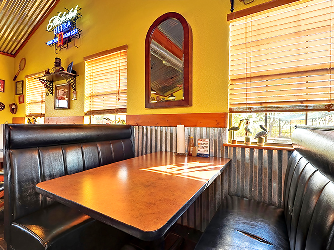 Booth seating with corrugated metal wainscoting creates the perfect Texas diner atmosphere&mdash;casual enough for jeans, special enough for birthday celebrations.