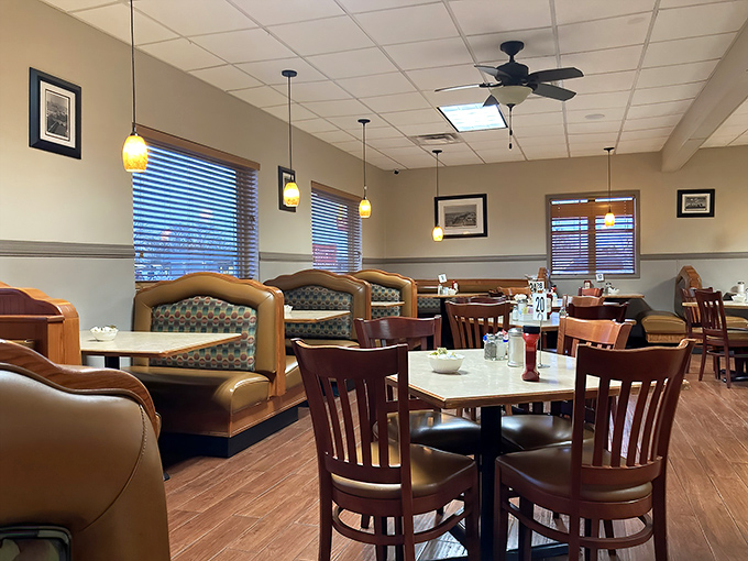 Booths designed for comfort, not Instagram. Those pendant lights cast the perfect glow for both menu-reading and the "should I get dessert?" debate (spoiler: yes).