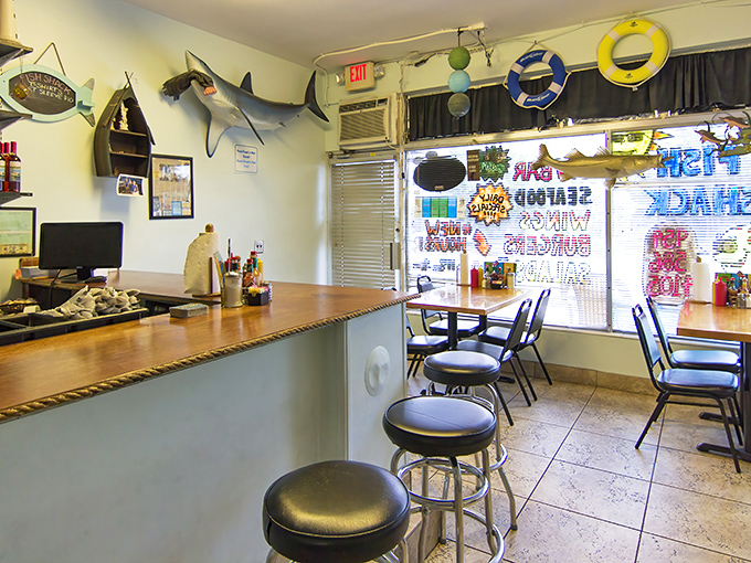 Sharks on the wall, nautical touches everywhere&mdash;this isn't d&eacute;cor from a catalog. It's the real deal, collected by people who know their fish.