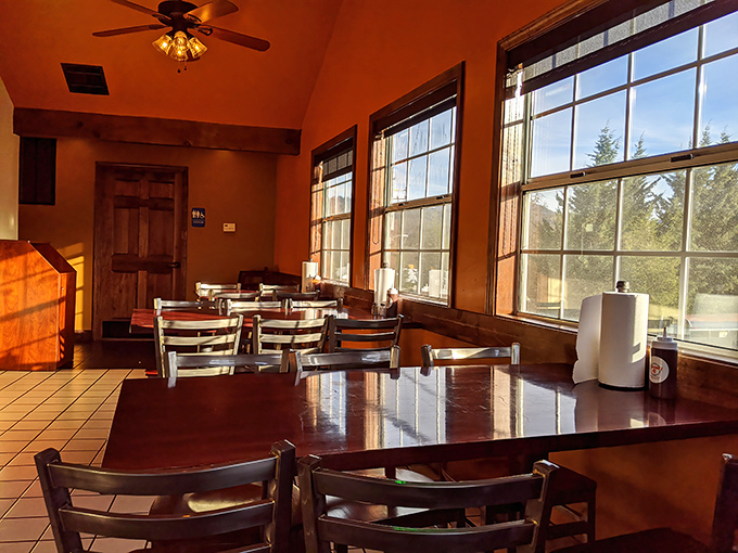 Warm wood tones and comfortable seating create the perfect backdrop for serious barbecue contemplation sessions.