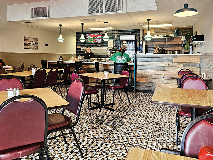 Teal pendant lights, rustic wood paneling, and an atmosphere that says "stay awhile." Diners were perfecting hygge before it was cool.