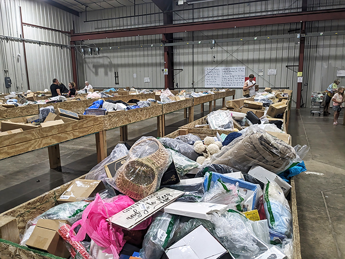 The modern-day treasure map. Shoppers navigate the maze of bins with the focus of archaeologists, each hoping to unearth that perfect find before someone else spots it.