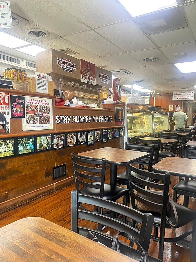 "Stay Hungry My Friends" isn't just a sign&mdash;it's a life philosophy when surrounded by these wooden tables and deli treasures.