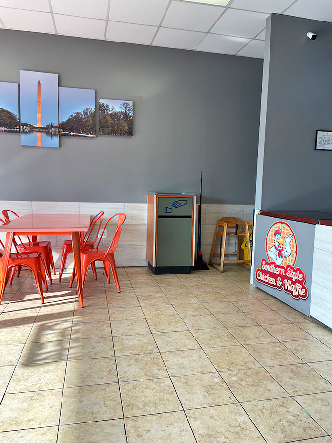The Washington Monument artwork reminds you you're in Virginia, but the red chairs and comfort food menu transport you straight to the South.