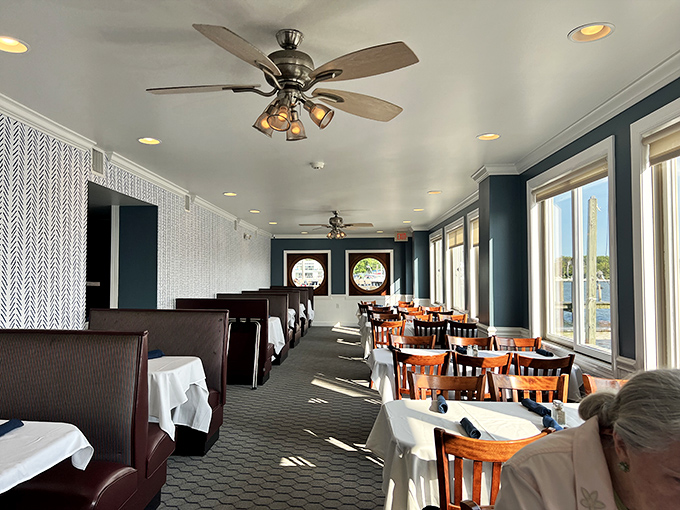 Ceiling fans lazily spin above white tablecloths and wooden chairs. The nautical-but-nice interior strikes the perfect balance between casual and special occasion.