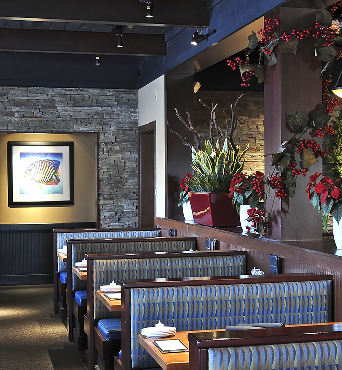 The thoughtful interior design balances nautical touches with contemporary elegance, never veering into "fisherman's net on the ceiling" territory.