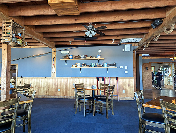 The dining room feels like the world's coziest ship's cabin, where every table promises both comfort and adventure.