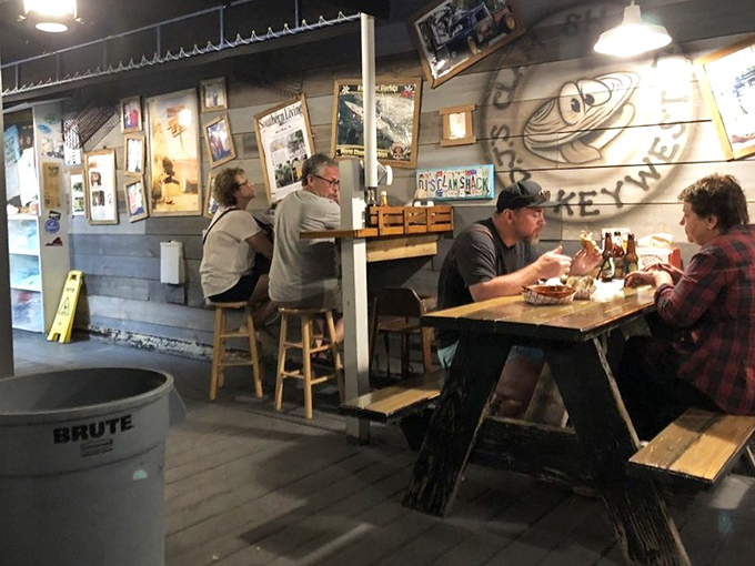 Rustic charm isn't manufactured here—it's earned. Every scratch on these tables represents someone who couldn't put their fork down.