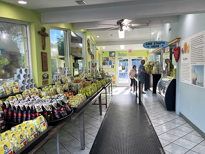 The shop's interior is a treasure trove of citrus-themed delights, with a helpful "Line Starts Here" sign for when pie-seeking crowds descend.
