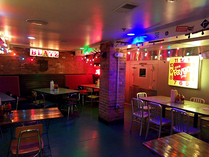 The evening atmosphere transforms Mercury into a neon-lit wonderland where burgers and good times flow equally freely.