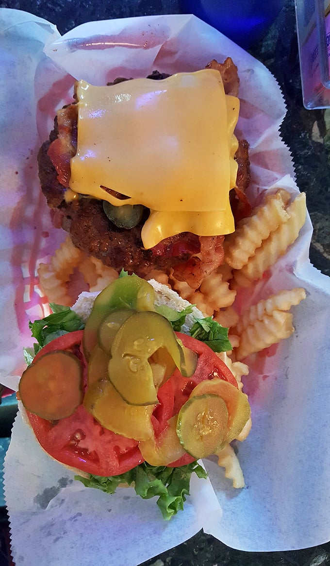 This isn't just a burger&mdash;it's architecture. Layers of beef, cheese, pickles, and fresh veggies create the skyscraper of satisfaction every appetite deserves.