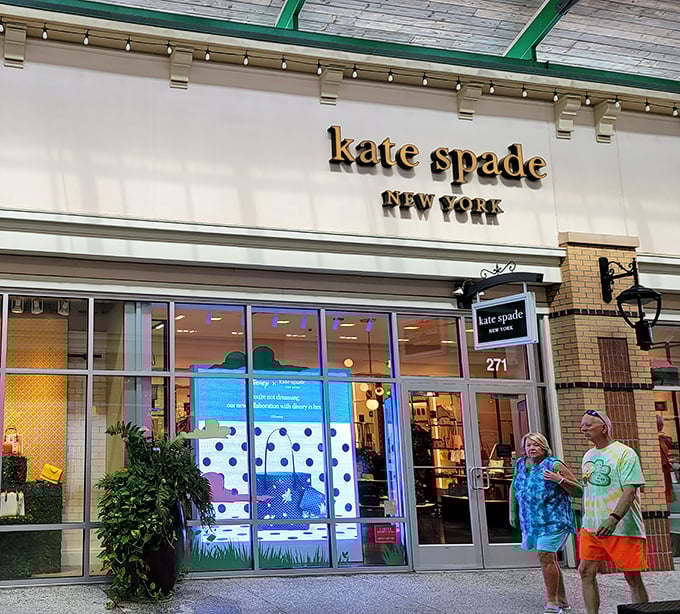 Kate Spade New York beckons with its clean storefront and colorful displays, proving that good taste and good deals aren't mutually exclusive concepts.