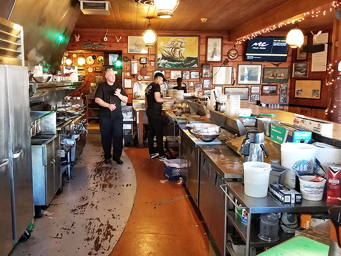 Where the magic happens&mdash;the kitchen crew orchestrates a symphony of seafood. Organized chaos producing delicious results.