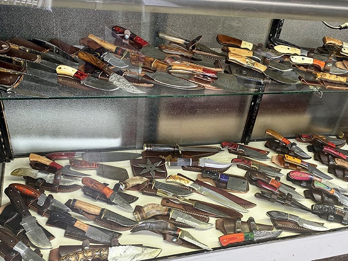 Knife collectors, shield your wallets. This display case holds enough bladed temptation to make a chef or outdoorsman weak in the knees.