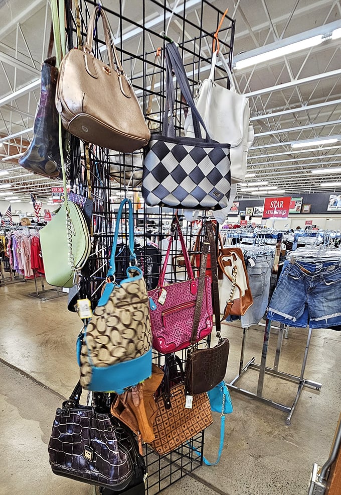 Handbag heaven hanging in suspended animation. Designer knockoffs mingle with authentic vintage finds in this accessories wonderland.