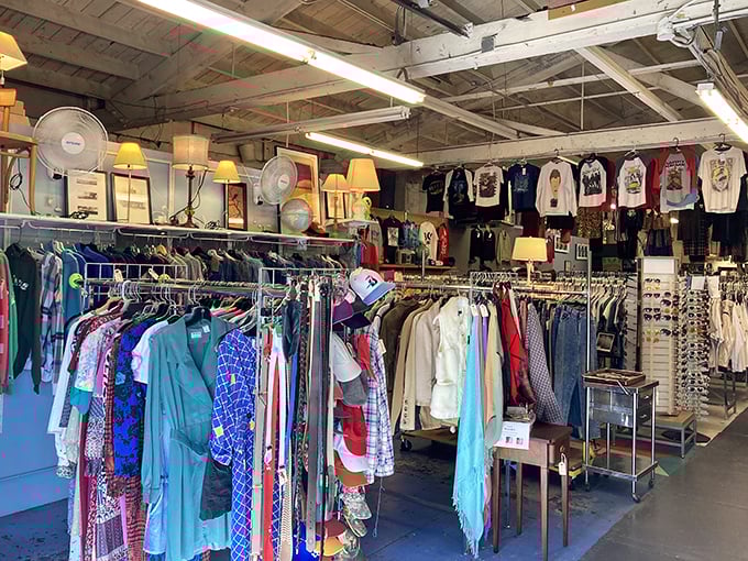 Vintage lamps cast a golden glow over racks of possibility. The ceiling fans aren't just practical&mdash;they're time machines from 1982.