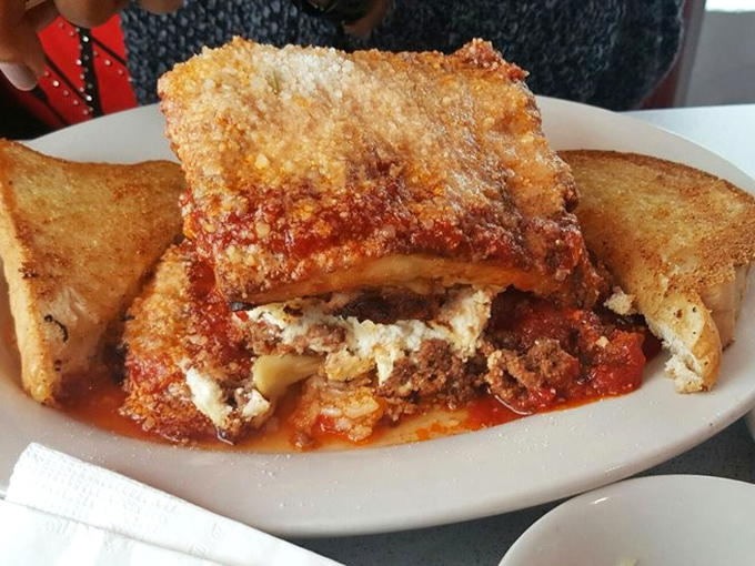 This isn't just lasagna; it's an archaeological dig of flavor, with layers that tell a delicious story of tomatoes, cheese, and perfectly seasoned meat.