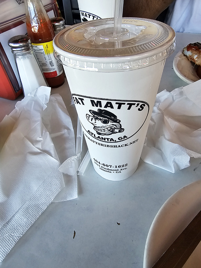 A Fat Matt's cup isn't just a vessel&mdash;it's a portable piece of Atlanta barbecue history, complete with their signature cartoon pig.