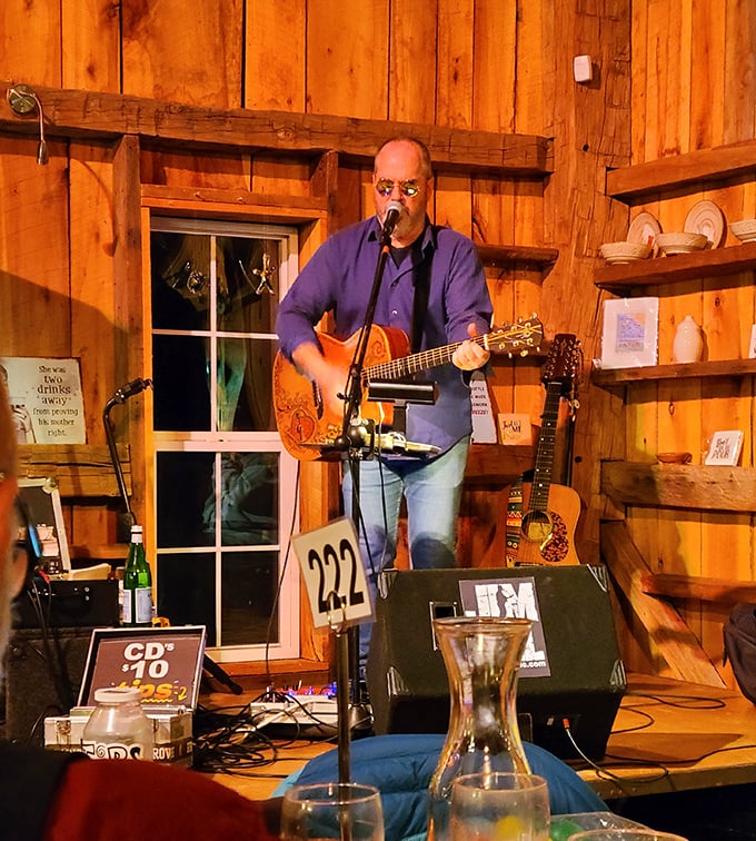Live music fills the barn with acoustic melodies, proving that wine tastes even better when accompanied by a soundtrack.
