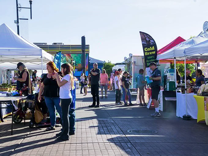 The farmers market buzzes with the energy of real people selling real food they actually grew, a refreshing alternative to the fluorescent-lit produce purgatory of chain supermarkets.