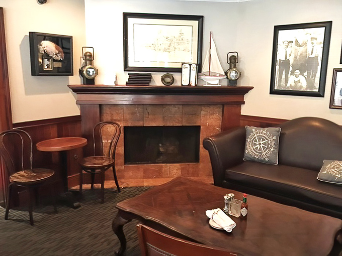 The lounge area's nautical-chic fireplace corner feels like the cozy captain's quarters of a very stylish yacht.