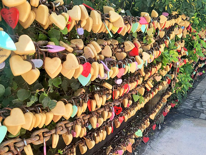 Love locks create a romantic backdrop where couples pledge eternal devotion over exceptional pie experiences.