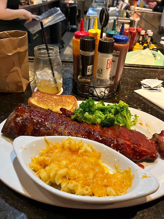 A rack of ribs lounging beside mac and cheese that's achieved that perfect orange hue&mdash;the color that signals comfort is imminent.