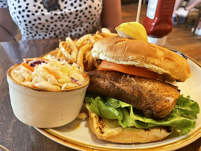 This blackened fish sandwich isn't just lunch&mdash;it's a vacation between two pieces of bread, with coleslaw that adds the perfect crunch.