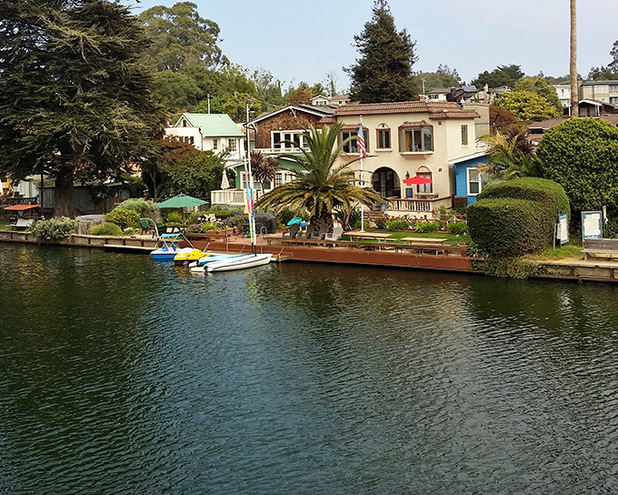 Colorful homes with private docks line the creek, creating a Venice-meets-Santa Cruz vibe that's quintessentially Capitola.
