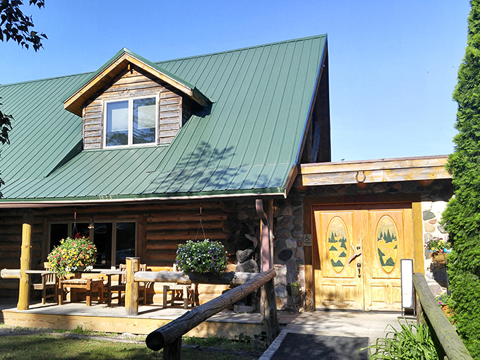 This rustic log cabin looks like it was plucked straight from a "Cozy Midwest Getaways" Pinterest board &ndash; complete with porch perfect for morning coffee.