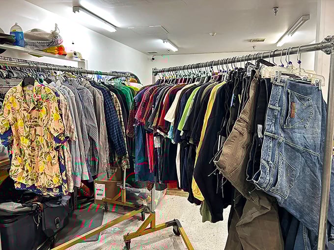 The men's clothing section: where Hawaiian shirts dream of beach vacations and vintage denim jackets whisper stories of their former lives.