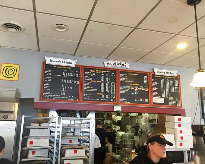 Behind these menu boards lies a sticky bun laboratory where magic happens daily. The "Extremely Addictive" warning isn't hyperbole&mdash;it's a public service announcement.