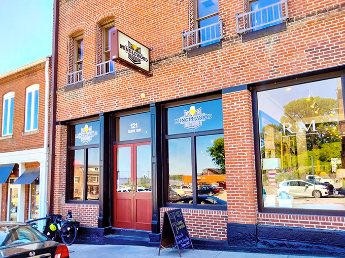 Minglewood Brewery's classic brick storefront houses modern craft beer ambitions, where traditional architecture meets contemporary taste in perfect harmony.