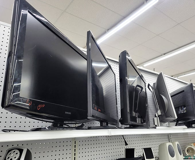 Television technology through the ages stands at attention. Remember when these flat screens were the height of luxury? Now they're thrift store treasures!