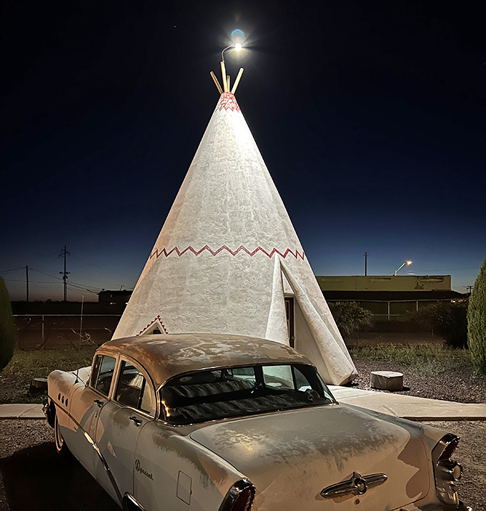 After dark, these illuminated wigwams become beacons of nostalgia along the legendary Mother Road.