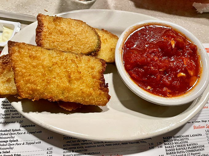 Garlic bread that's achieved the perfect golden ratio&mdash;crisp exterior, pillowy interior, and enough garlic to keep vampires at bay for a fortnight.