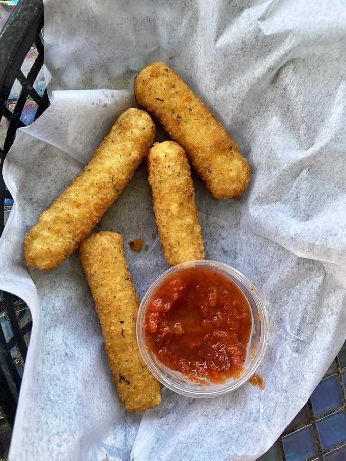 Mozzarella sticks: proof that anything is improved by breading and deep-frying. The marinara dipping sauce adds the perfect tangy complement.