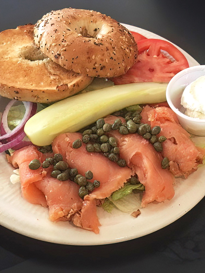 Lox of love on this plate. A bagel masterpiece with silky salmon, briny capers, and all the fixings that would make any New York deli nod in approval.