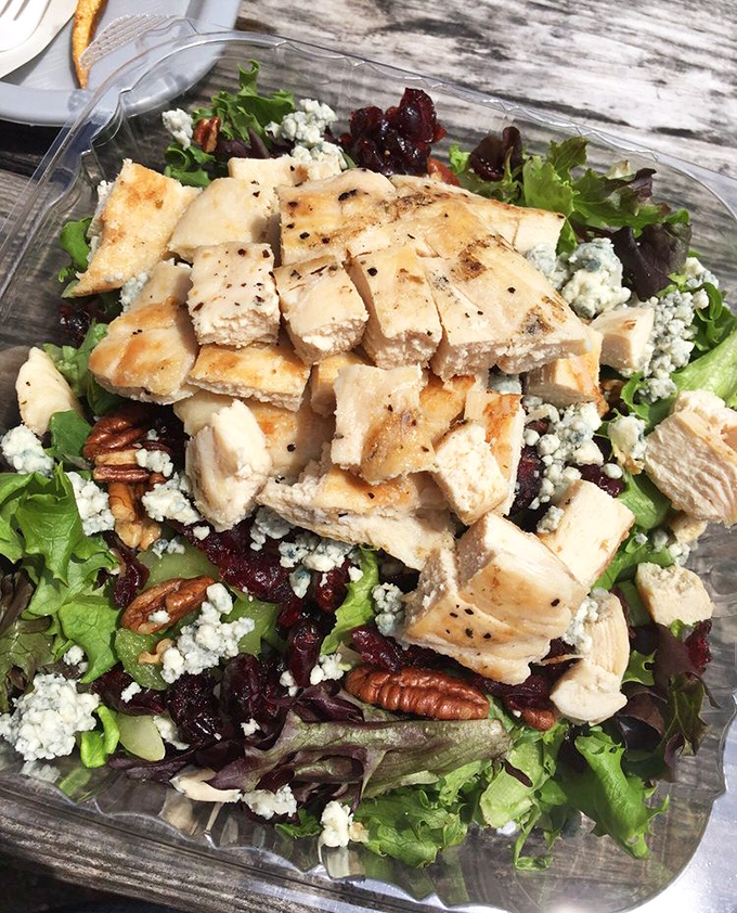 Fresh greens topped with grilled chicken transform a simple salad into something truly special.