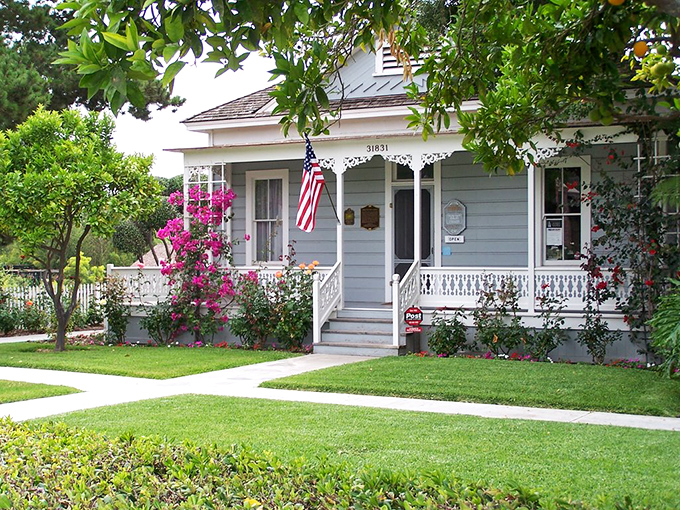 Victorian charm with a California twist. This historic cottage proves that gingerbread trim and bougainvillea make perfect architectural partners.