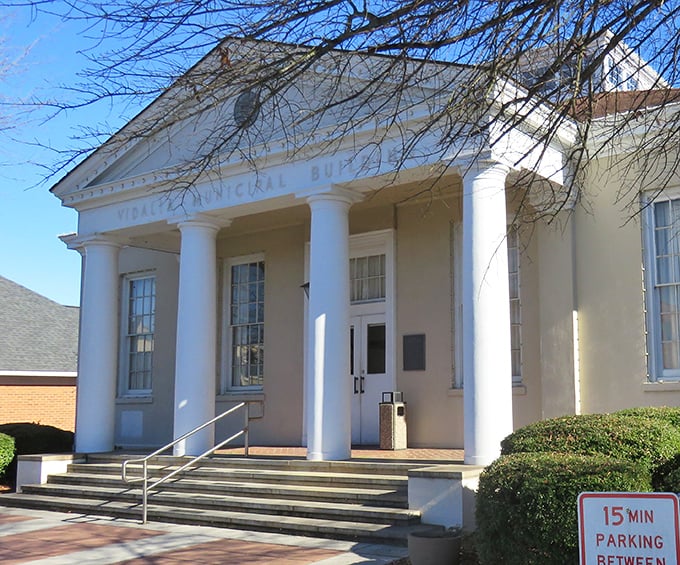 Vidalia's Municipal Building stands with columned dignity, a reminder that small-town governance can still appreciate classical architecture and civic pride.