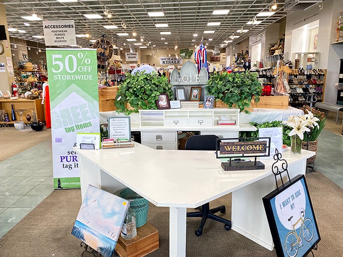 That "50% off" sign might as well read "Permission to shop without guilt." The welcoming front desk area invites you to start your treasure hunt.