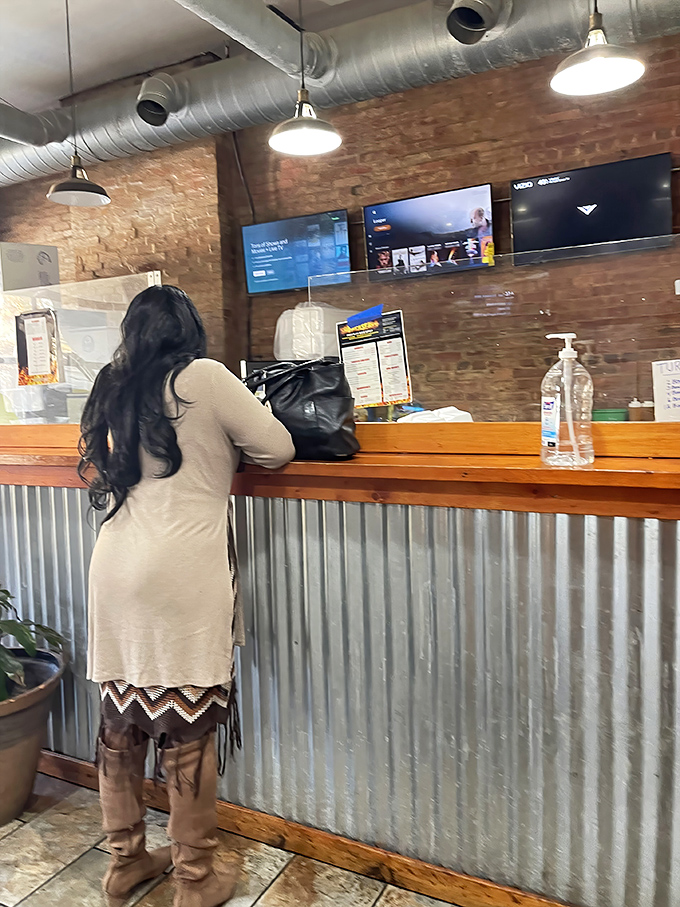 The counter where barbecue dreams come true. Industrial chic meets functional simplicity in this temple of smoked meat worship.