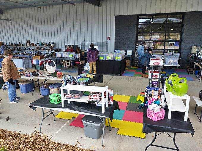 Booths arranged with military precision, but the treasures within are gloriously chaotic. The thrill of the hunt keeps shoppers moving from table to table.