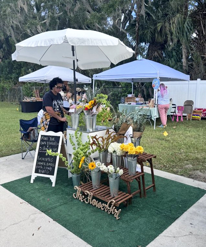 Even the outdoor area transforms into a pop-up marketplace. That flower stand is serving "cottagecore aesthetic" with a side of Florida sunshine.