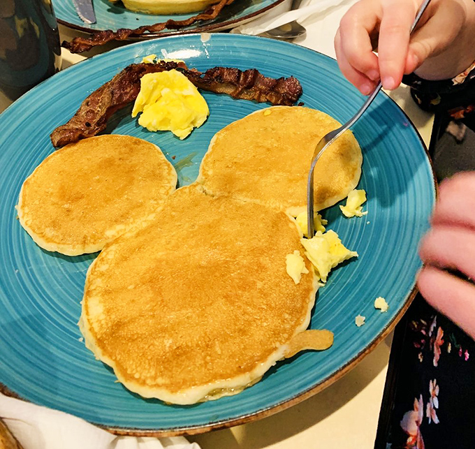 Fluffy pancakes that stack up like edible clouds, promising sweet morning bliss with every golden bite.