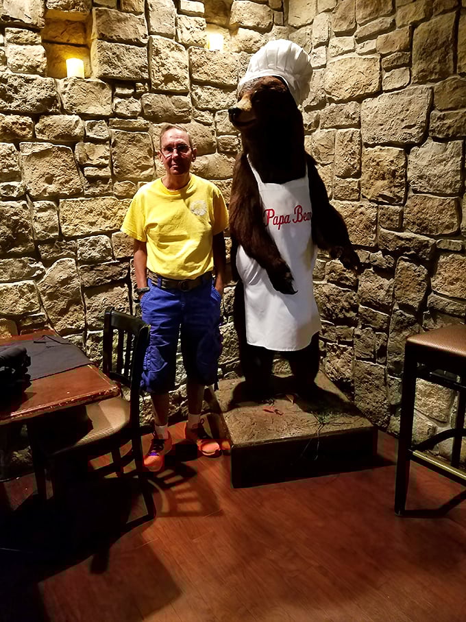 The restaurant's mascot stands guard in chef's attire&mdash;a whimsical touch that reminds you this place doesn't take itself too seriously, just its food.