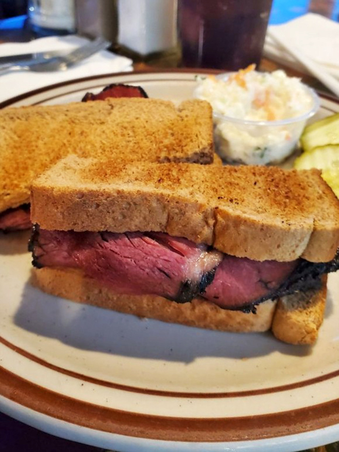 A pastrami sandwich that doesn't mess around&mdash;thick-cut meat, perfectly toasted bread, and a pickle standing guard on the side.